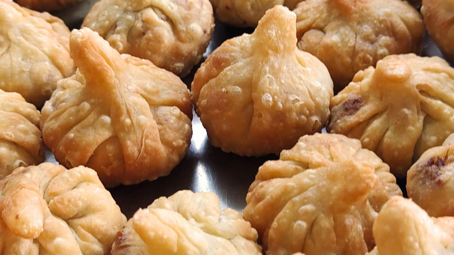 Jaggery Coconut Deep Fried Modak Recipe - Blue Nile Kitchen